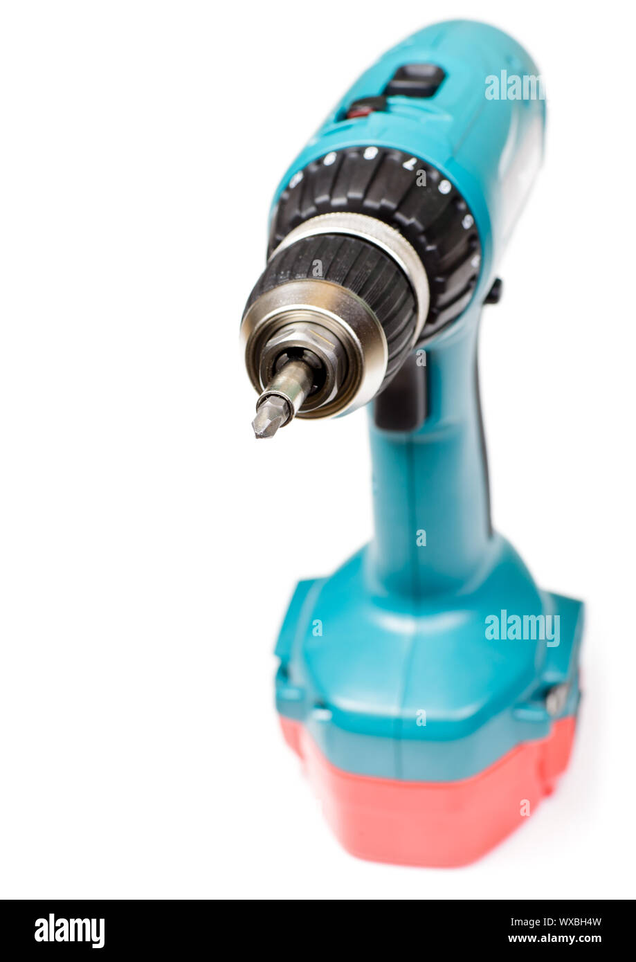 Cordless drill with fastener bit on white background Stock Photo - Alamy