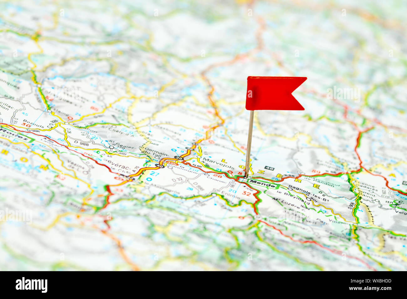 Red color flag pin on map, shallow focus Stock Photo - Alamy