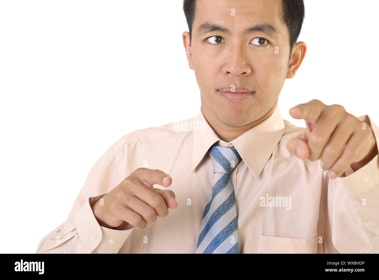 Asian businessman portrait with point pose on white background Stock ...