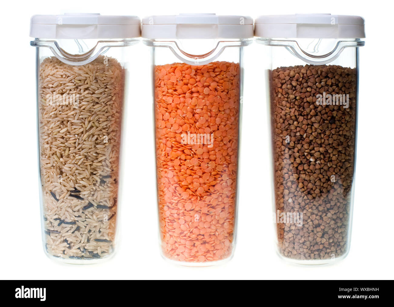 Rice red lentil and buckwheat in containers on white background Stock ...