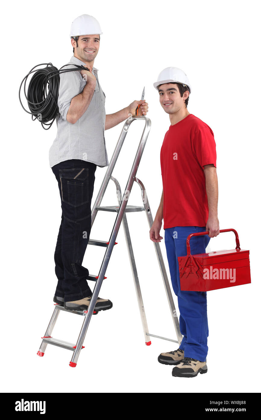 Man climbing ladder building repair Cut Out Stock Images & Pictures - Alamy