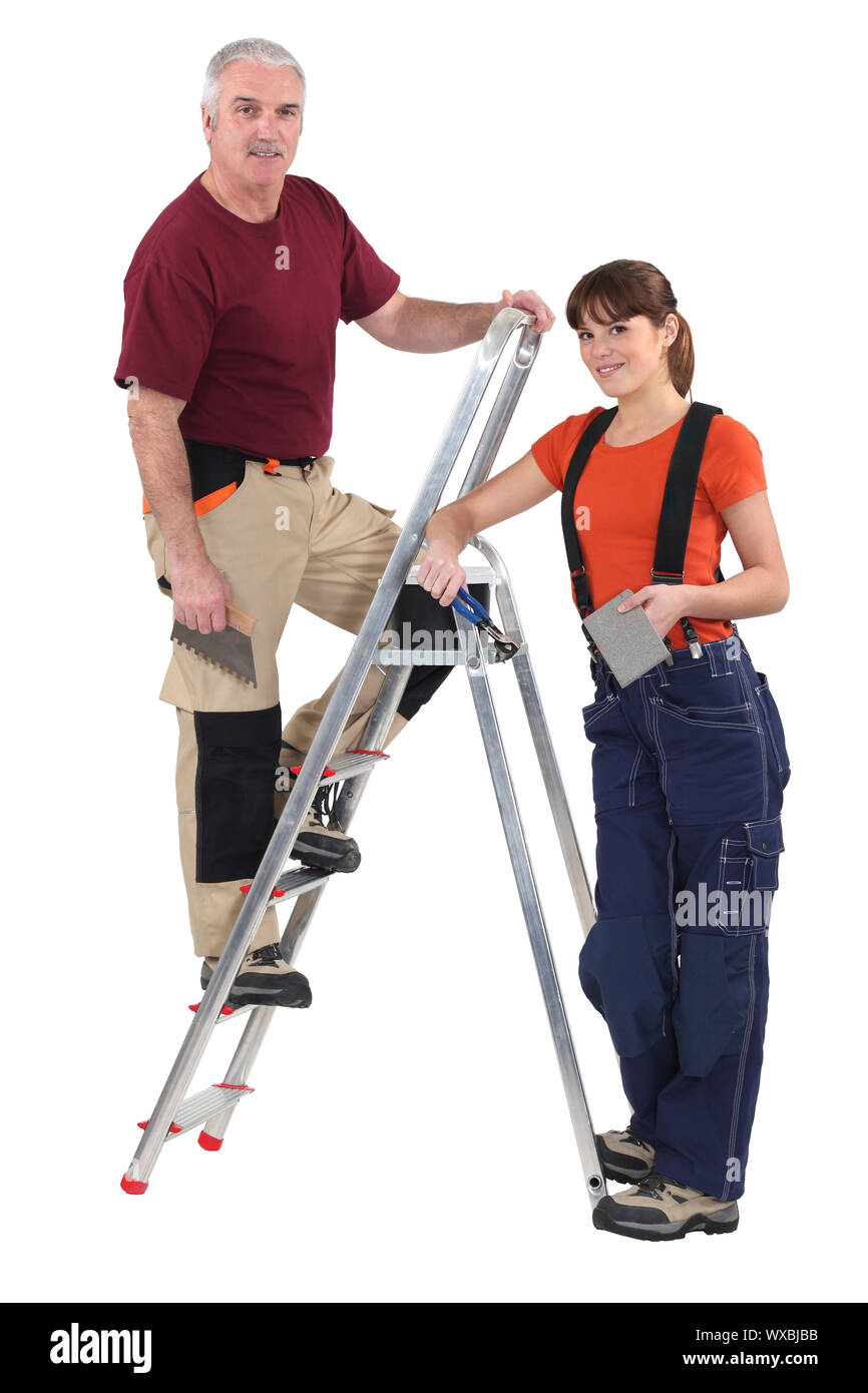 A tiler and his apprentice Stock Photo - Alamy