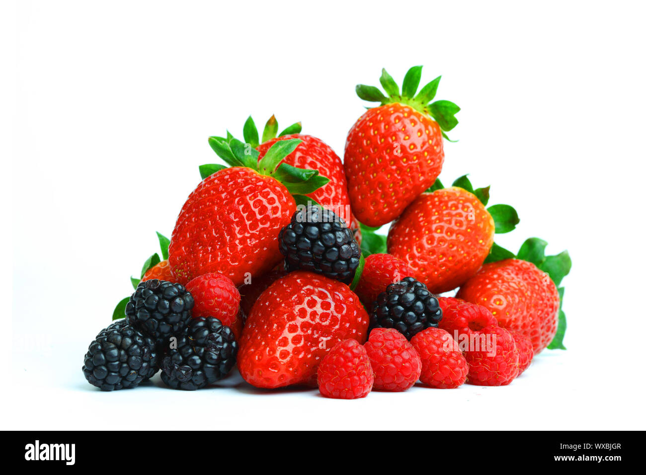 big berry pile isolated on white Stock Photo - Alamy