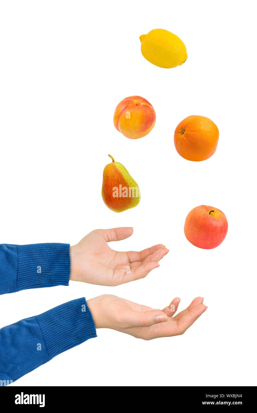 Juggling hands and fruits Stock Photo - Alamy