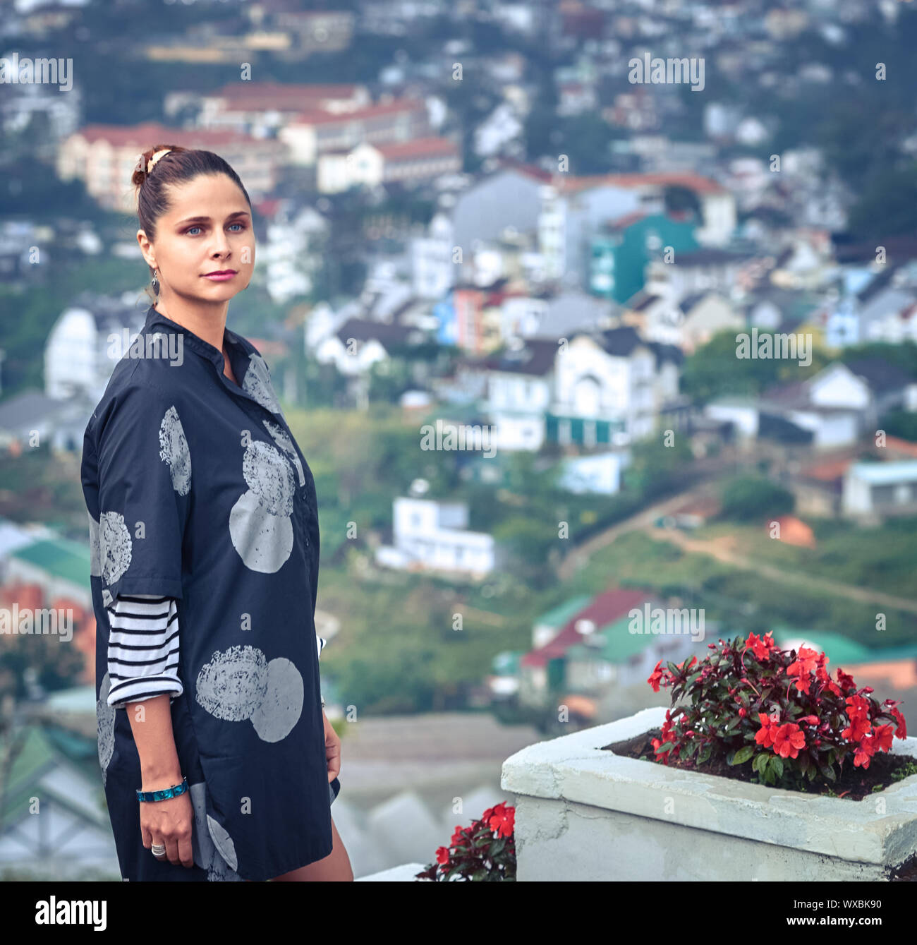 Woman overlooking town architecture hi-res stock photography and images ...