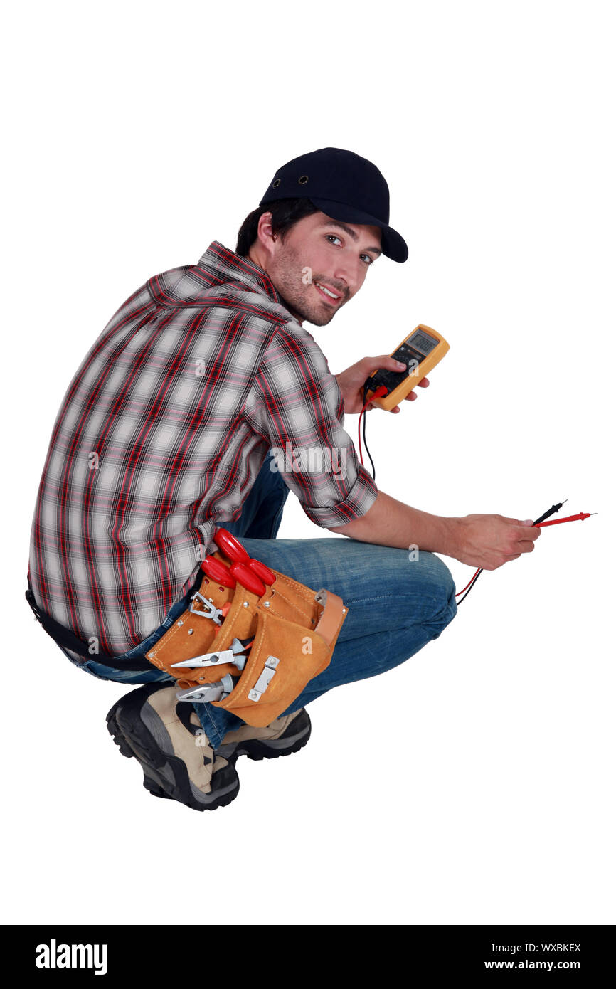 Electrician using multimeter test electrical hi-res stock photography ...