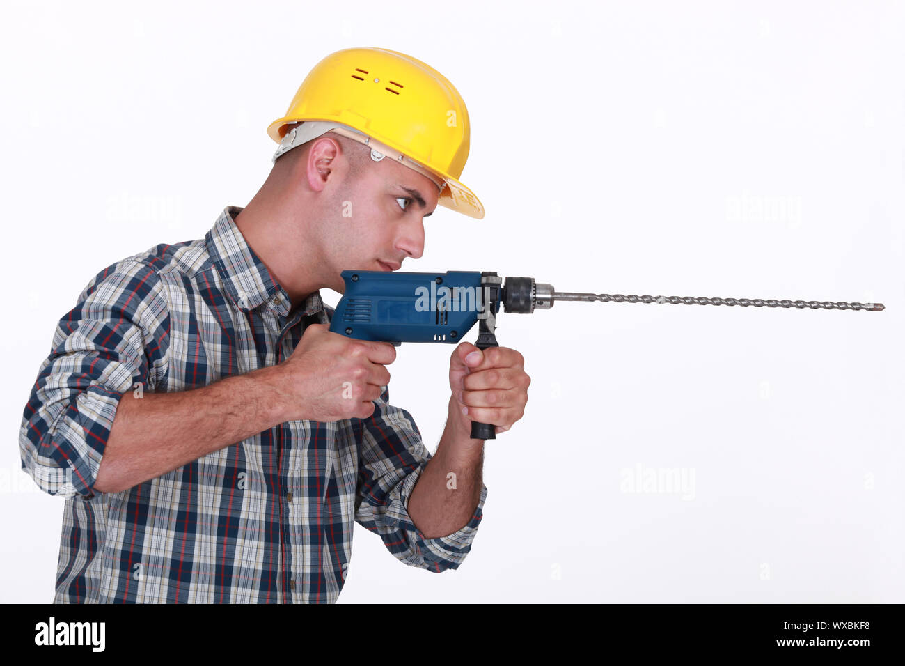 Tradesman using screwdriver hi-res stock photography and images - Alamy