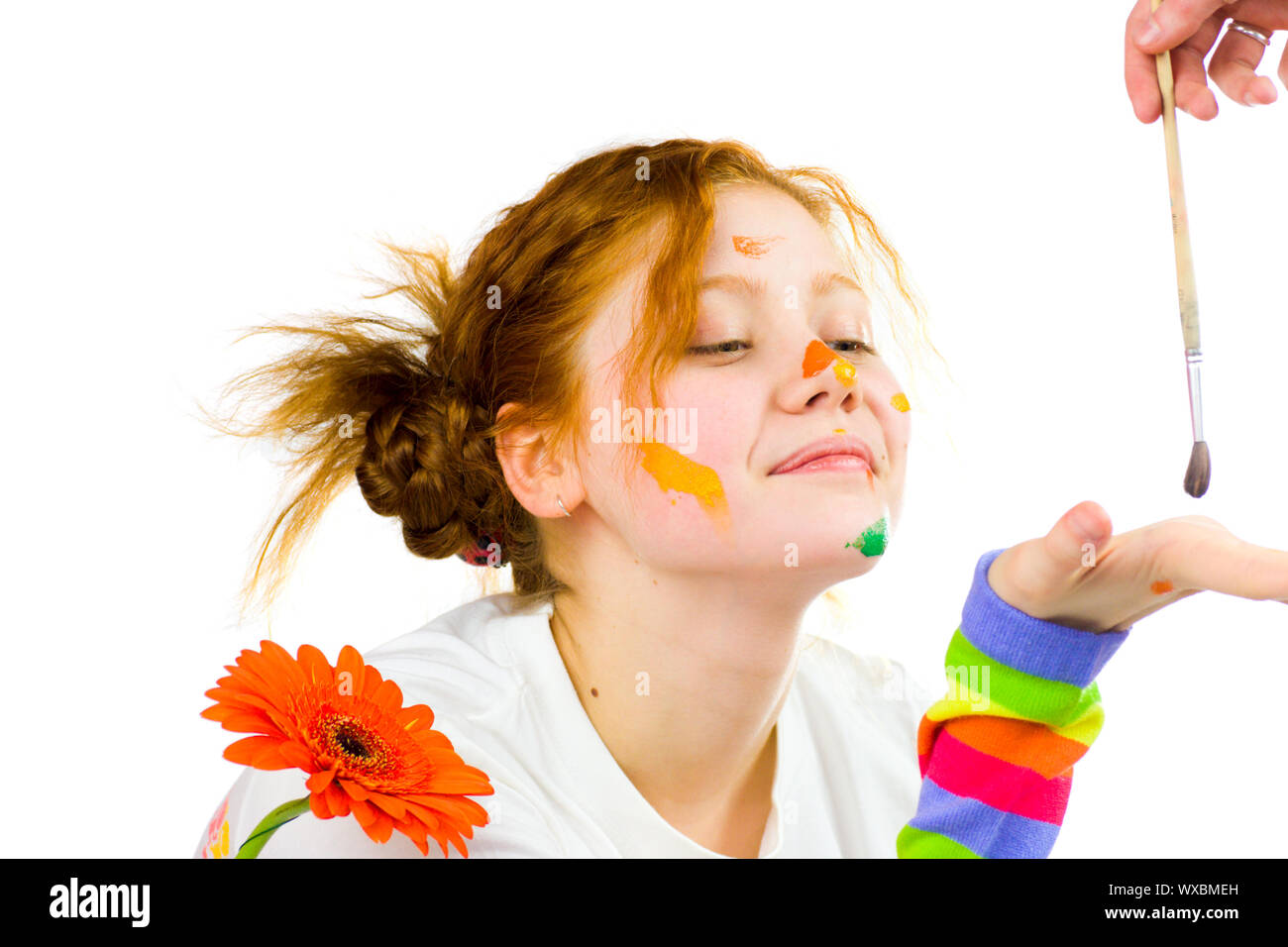 Funny artist with painted face and gerber isolated on white Stock Photo ...