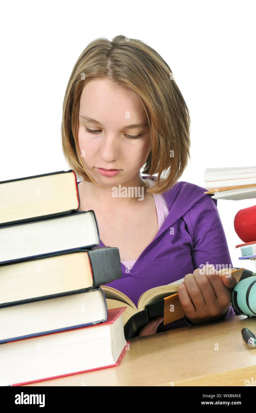 Teenage school girl studying at the desk Stock Photo - Alamy
