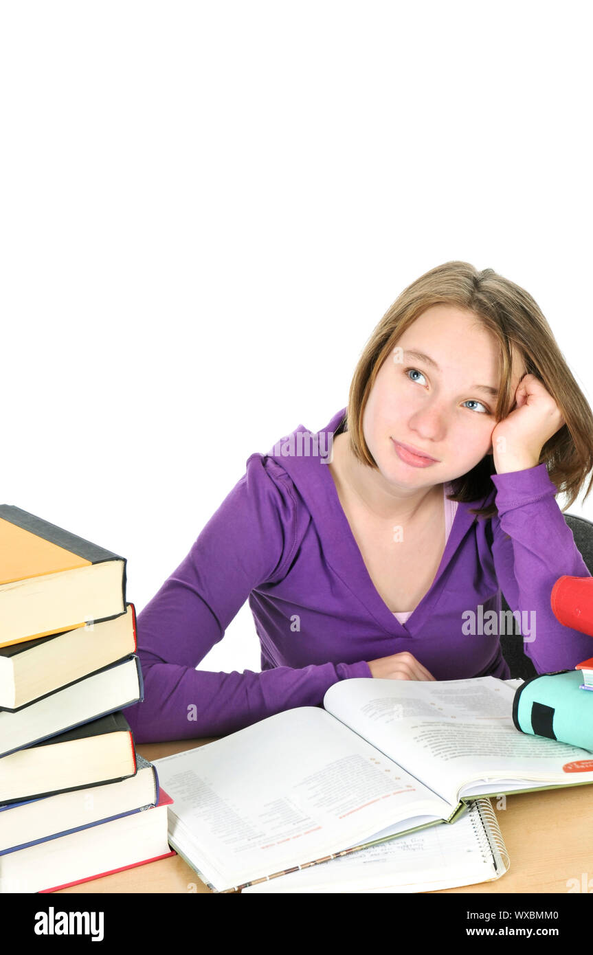 Teenage school girl studying at the desk Stock Photo - Alamy