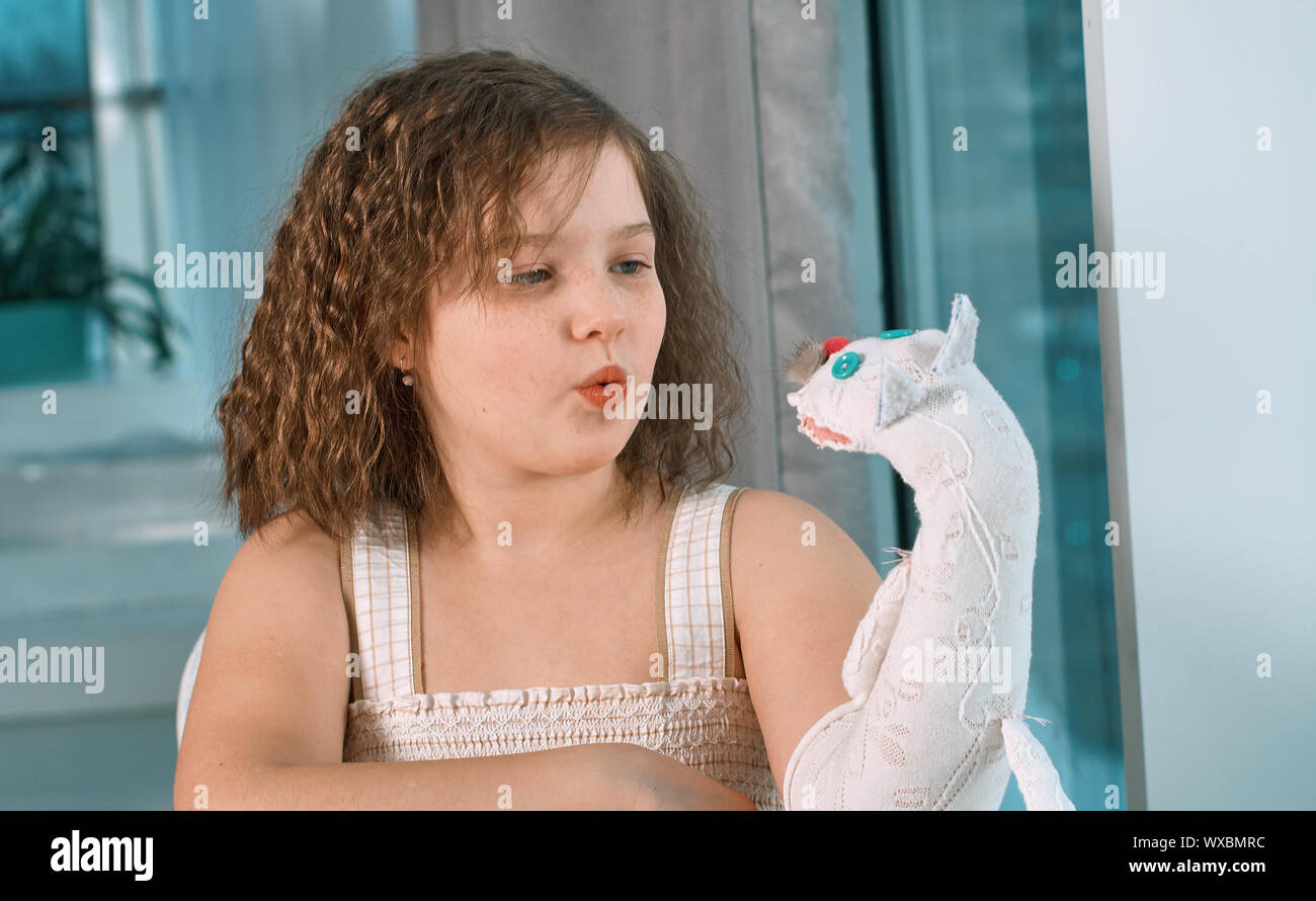 small girls with hand puppets Stock Photo - Alamy