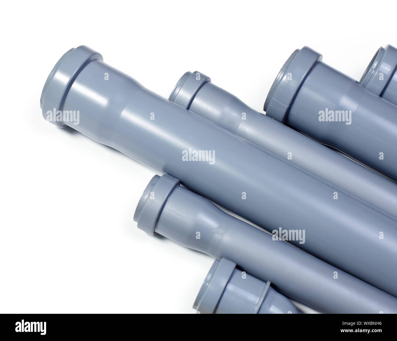 Grey PVC sewer pipes on white background Stock Photo - Alamy