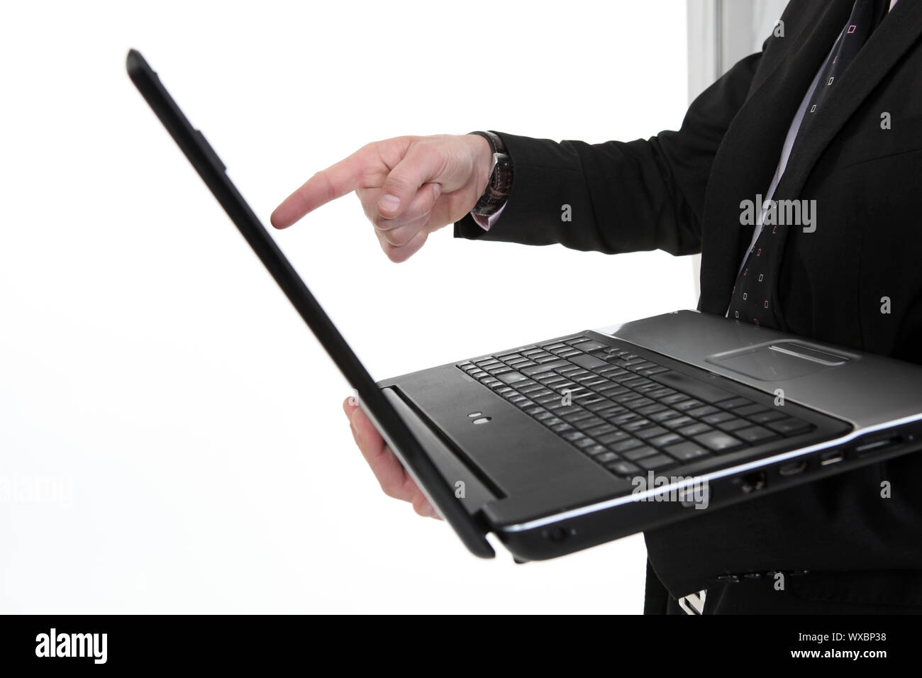 Male hand pointing to computer screen Stock Photo - Alamy