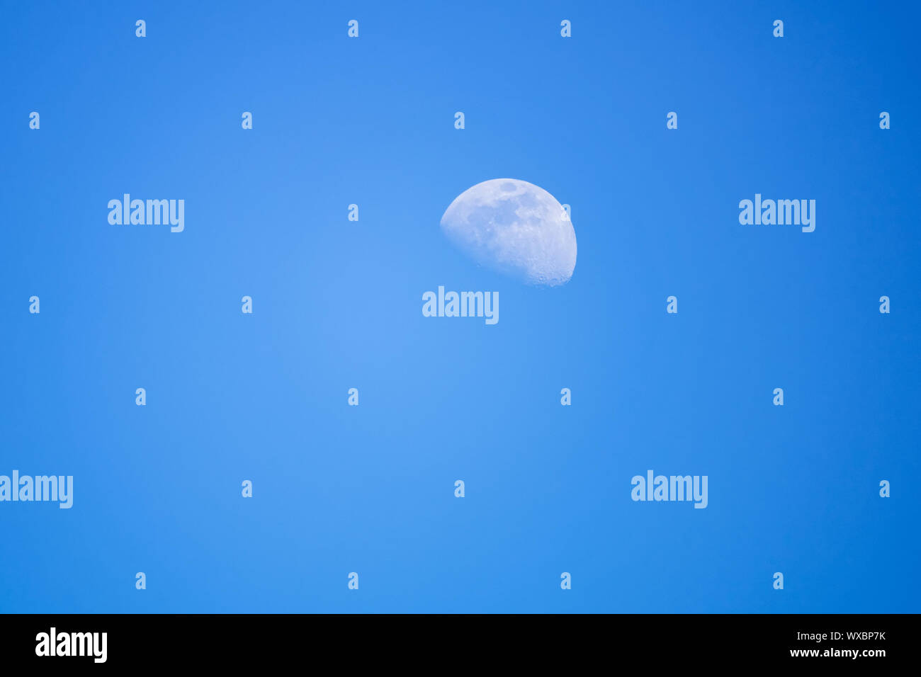 moon at day time sky background Stock Photo - Alamy