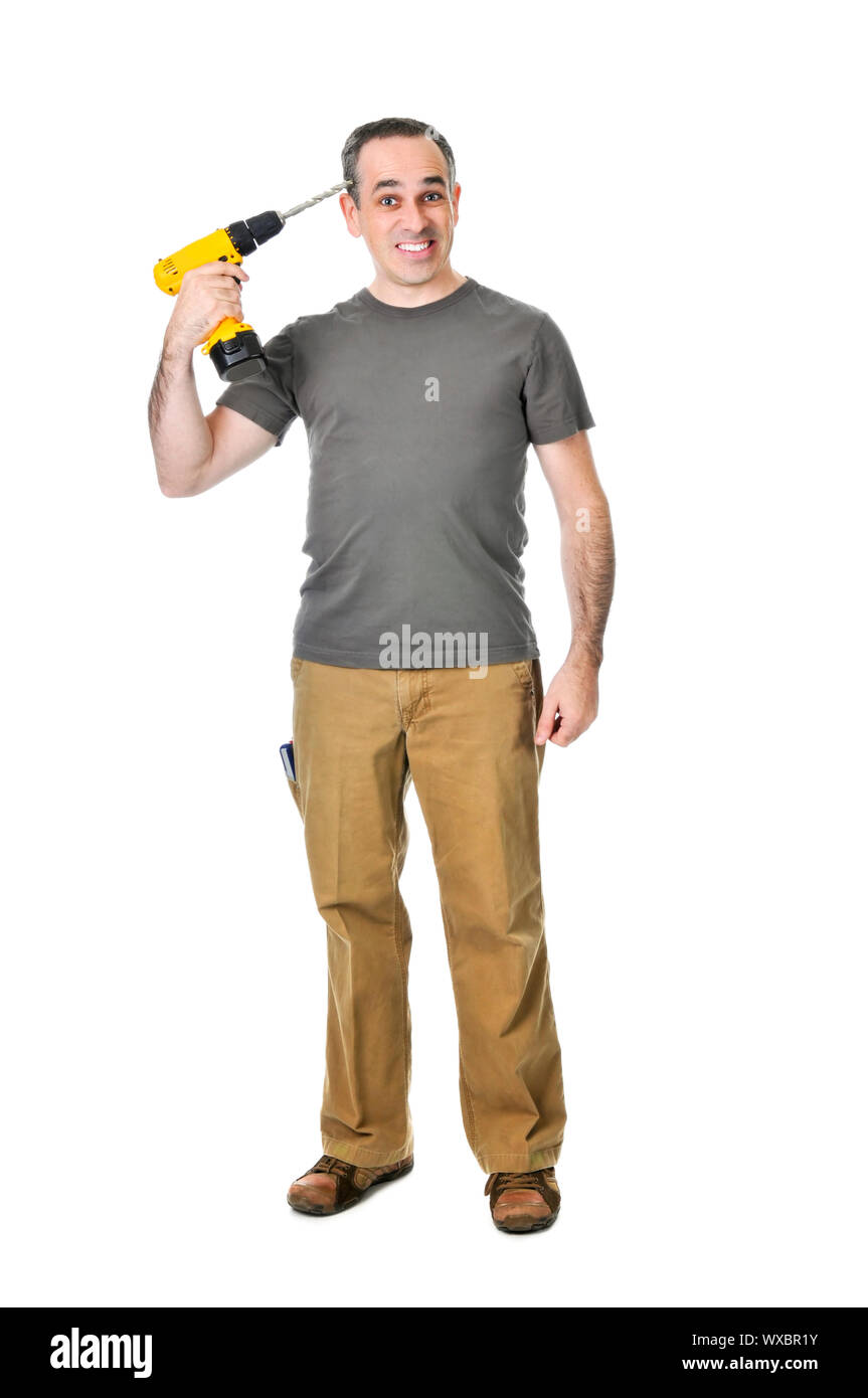 Frustrated handyman putting a drill to his head Stock Photo - Alamy