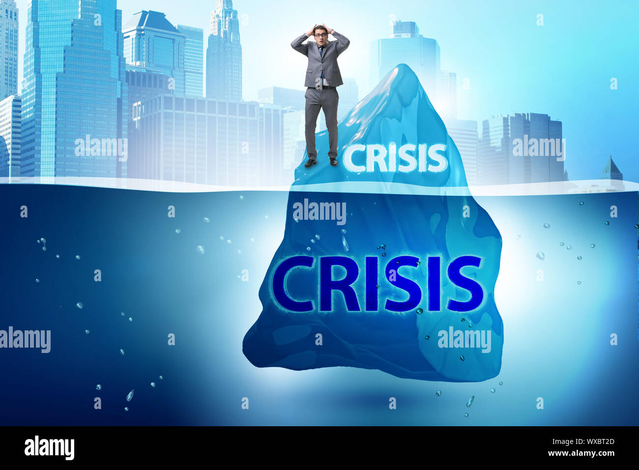 Crisis concept with businessman on iceberg Stock Photo - Alamy
