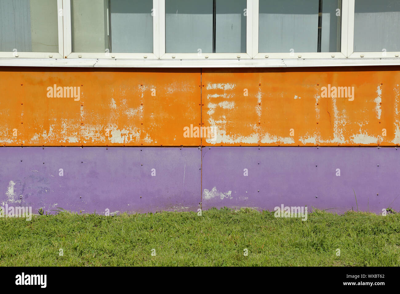 Textured surface of a bright building wall Stock Photo - Alamy