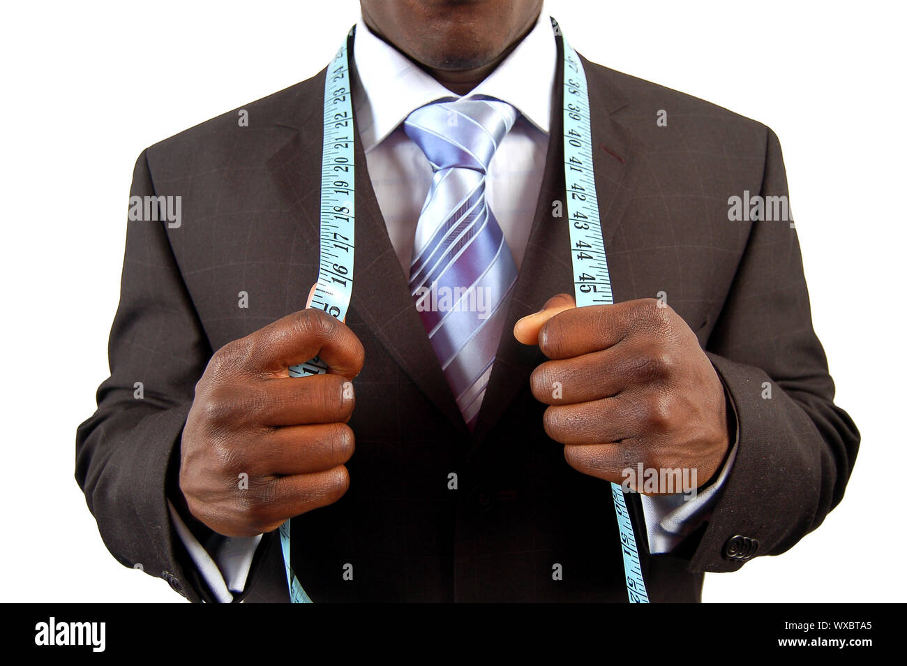 This is an image of a black business man, wearing measuring tape Stock ...