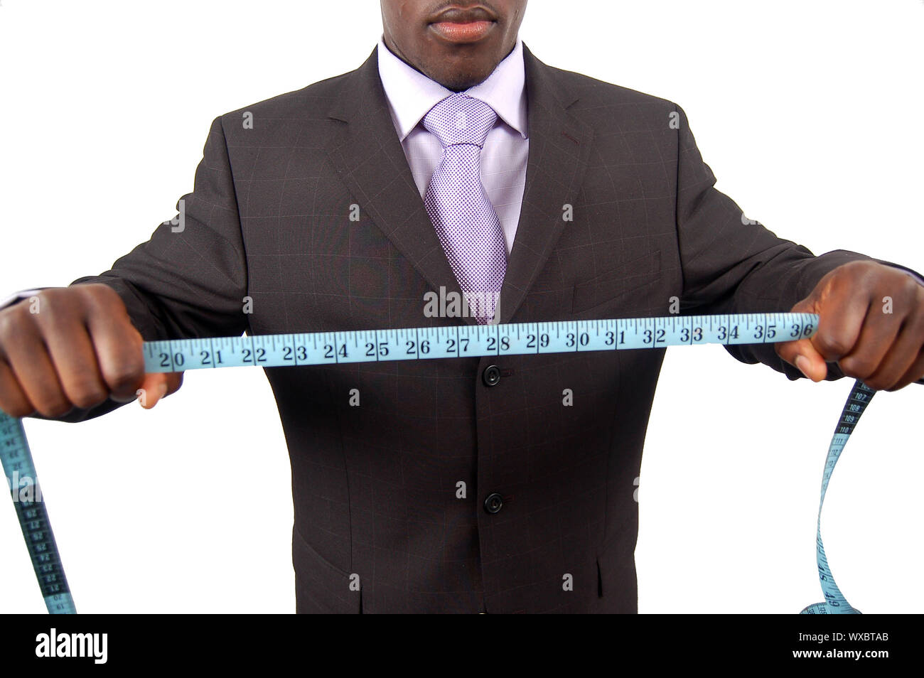 This is an image of a man with a measuring tape Stock Photo - Alamy