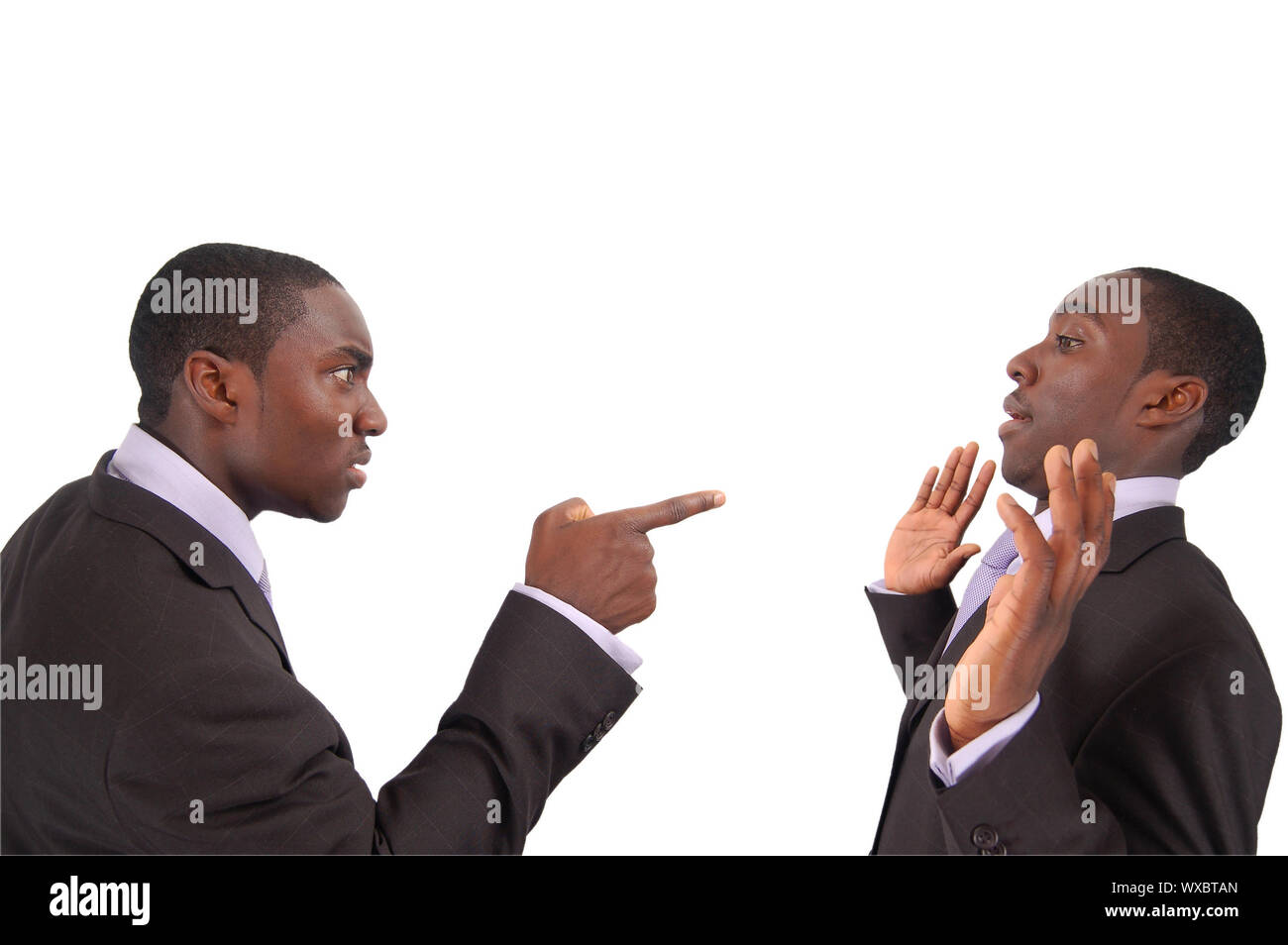 This is an image of business man arguing against himself. This ...