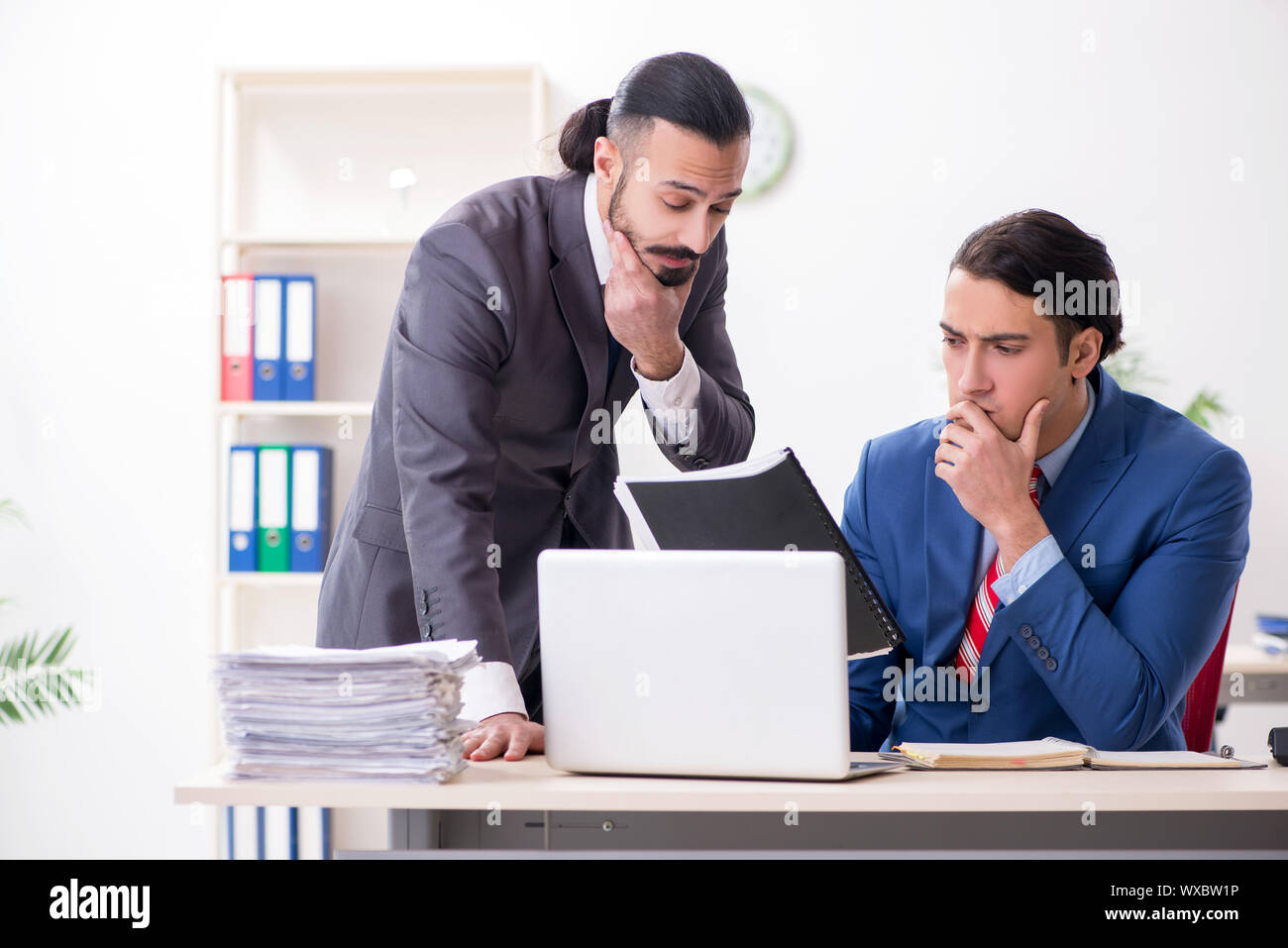 Two male colleagues in the office Stock Photo - Alamy