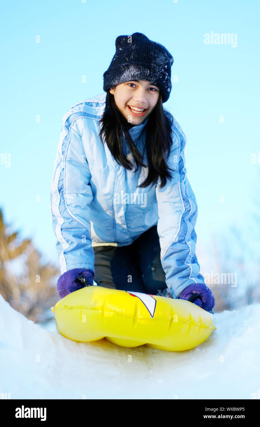 Children sledding multiethnic hi-res stock photography and images - Alamy