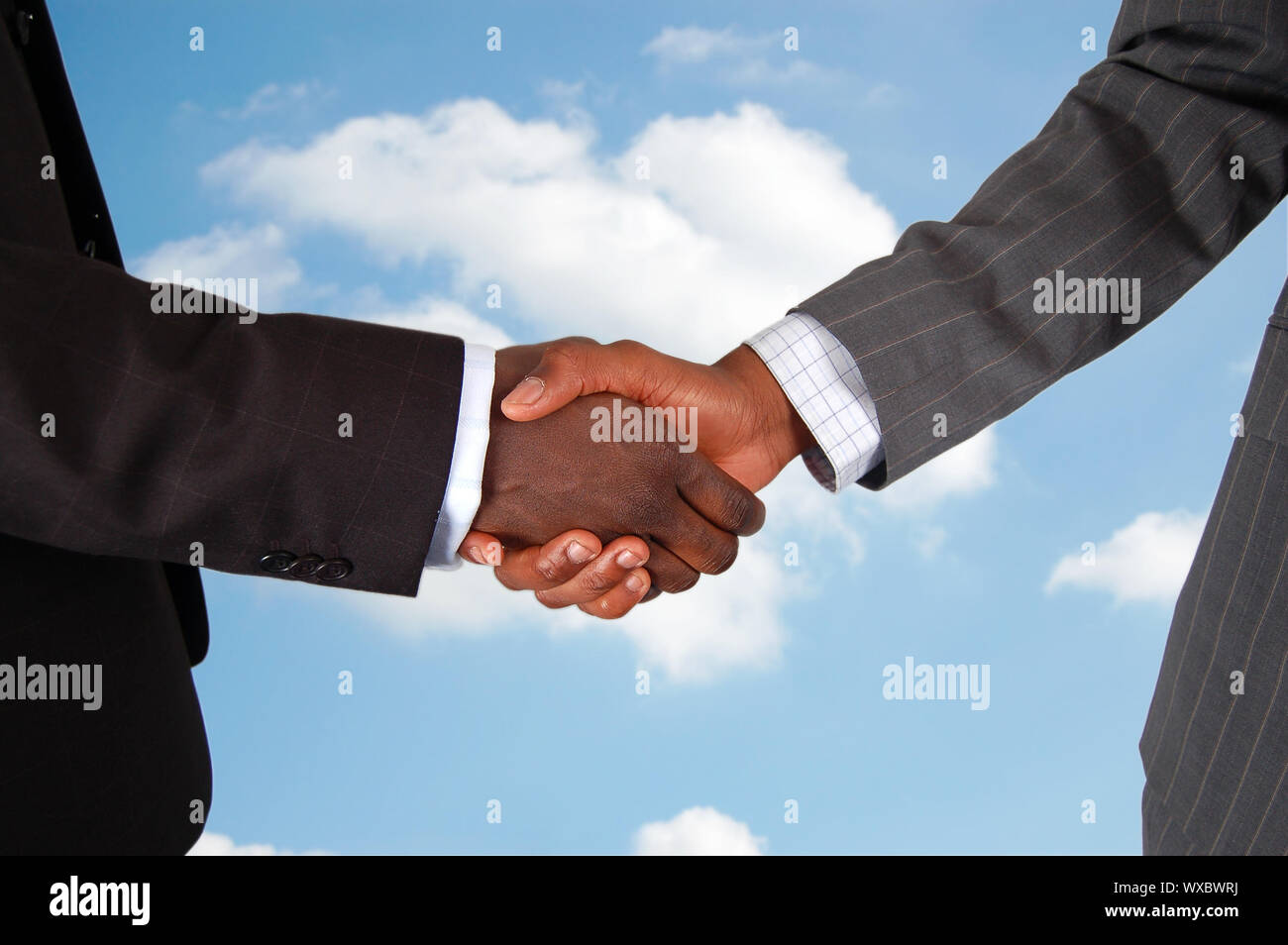 This is an image of two male bodies, representing businessmen in a ...