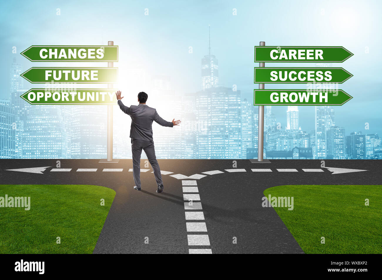 Business man standing at the crossroads hi-res stock photography and ...