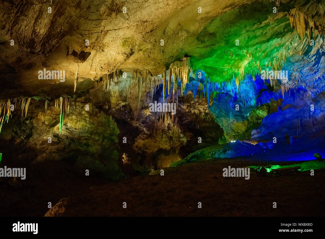 colorful illumination of Prometheus Cave Stock Photo - Alamy