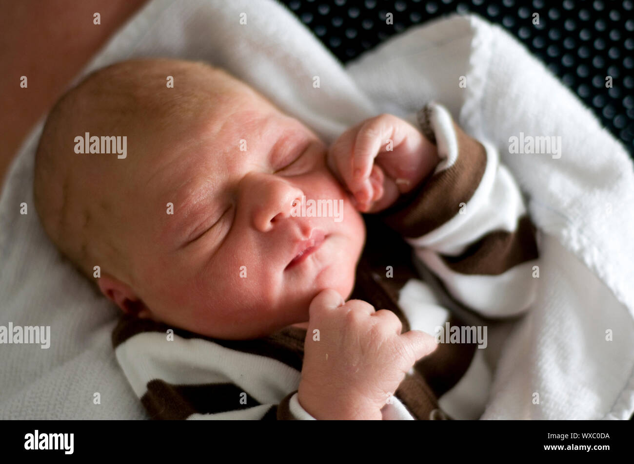 Just born baby sleeping Stock Photo - Alamy