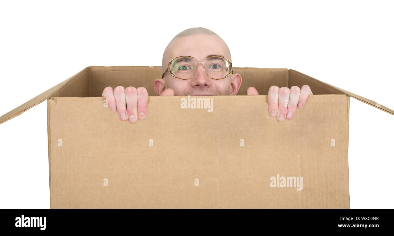 Man in carton on the white background Stock Photo - Alamy