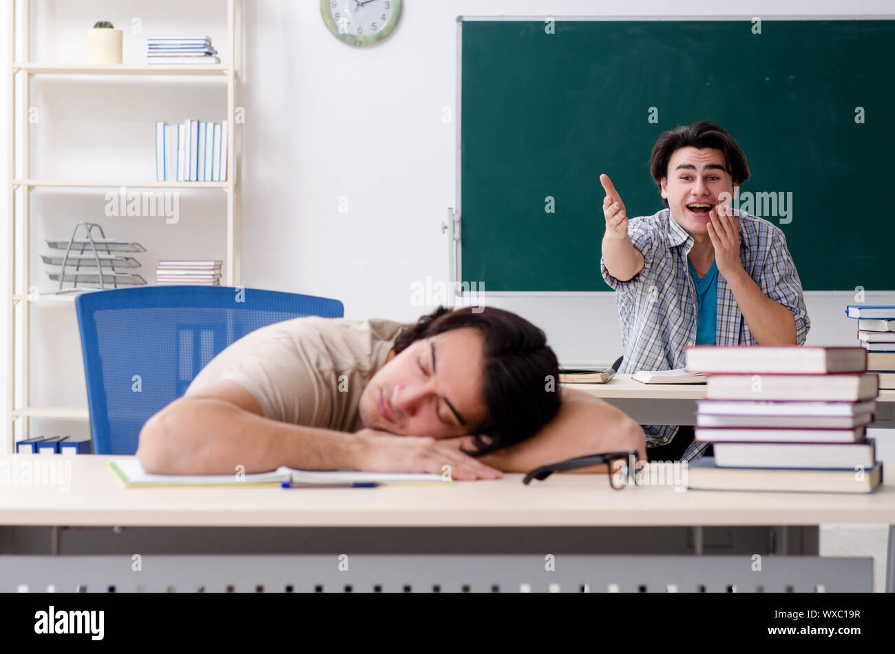 Two male students in the classroom Stock Photo - Alamy