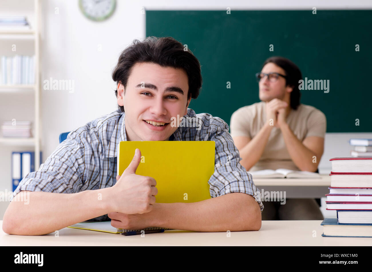 Two male students in the classroom Stock Photo - Alamy
