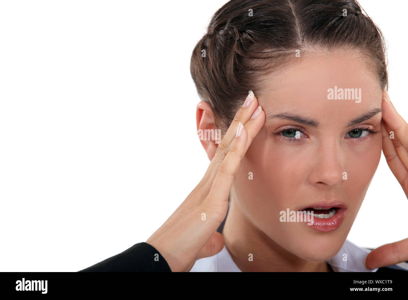 angry woman having a headache Stock Photo - Alamy