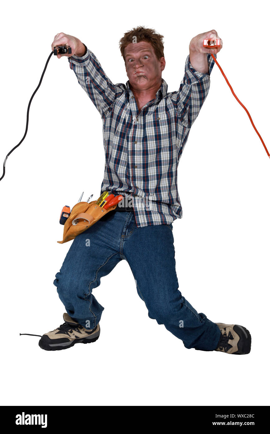 Man receiving electric shock Stock Photo - Alamy