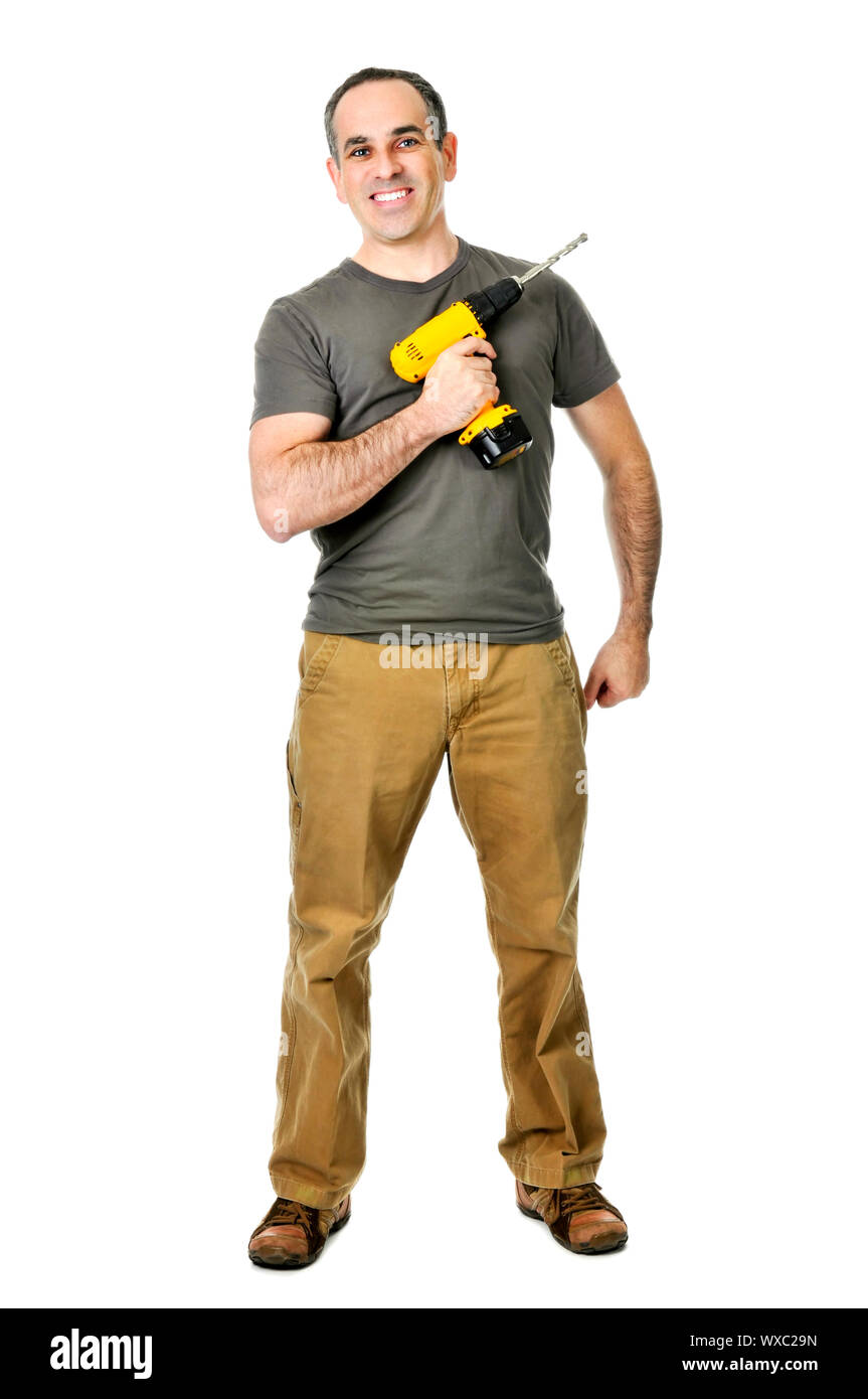 Smiling handyman ready to work holding a drill Stock Photo - Alamy