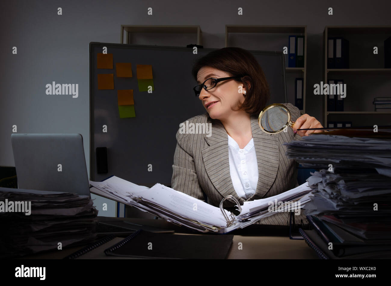 Female employee suffering from excessive work Stock Photo - Alamy