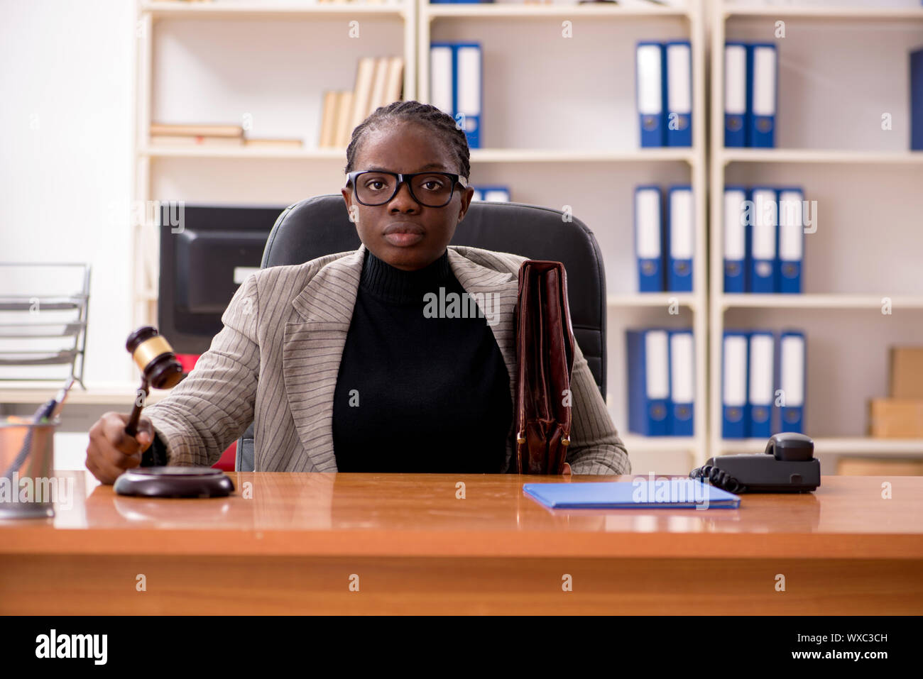 Black female lawyer in courthouse Stock Photo - Alamy