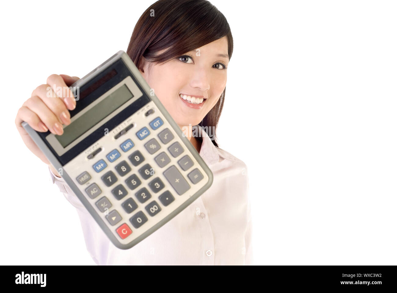 Business woman holding calculator on white background, focus on face ...