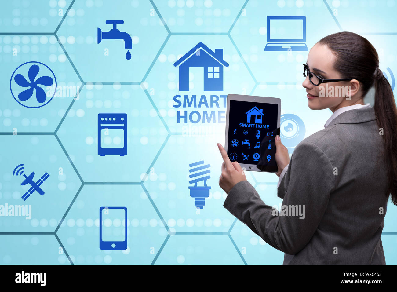 Smart home concept with woman Stock Photo - Alamy