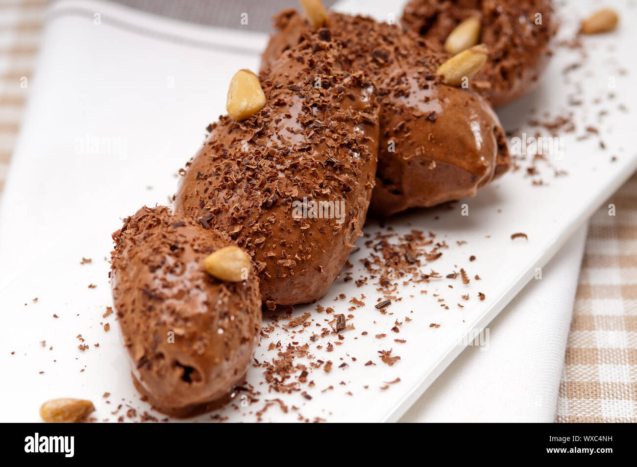 fresh home made chocolate mousse quenelle dessert Stock Photo - Alamy