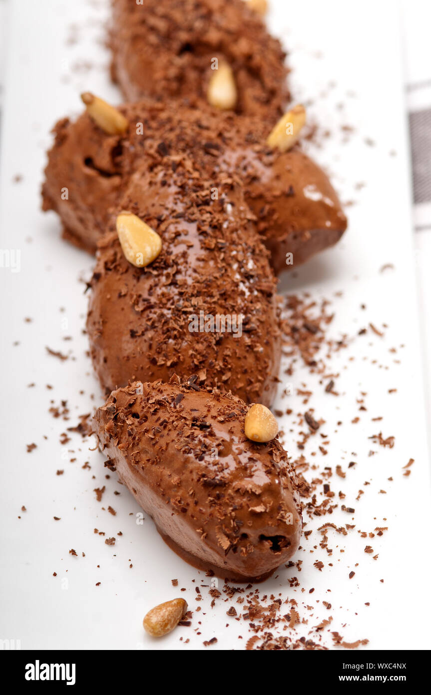 fresh home made chocolate mousse quenelle dessert Stock Photo - Alamy