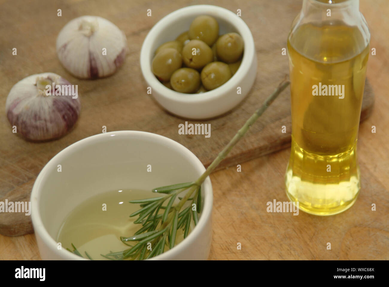 Rosmary with some oil in a white bowl Stock Photo - Alamy
