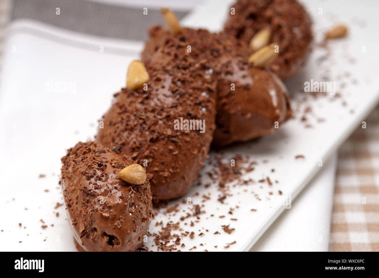 fresh home made chocolate mousse quenelle dessert Stock Photo - Alamy