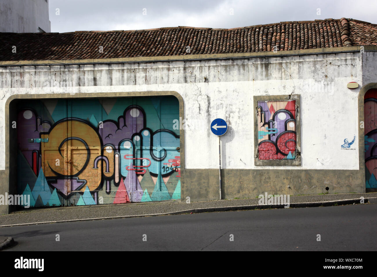 Graffiti - artistic design of wooden gates and shutters Stock Photo - Alamy