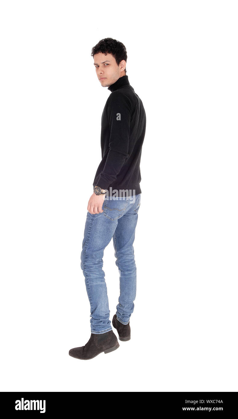 Tall handsome man standing in profile, looking Stock Photo - Alamy