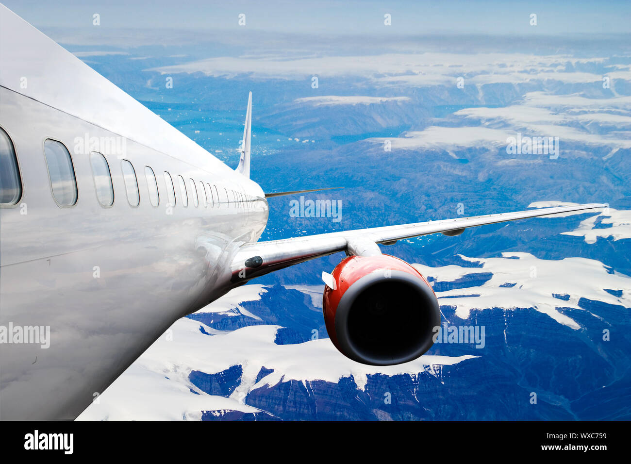 Jet wing over iceland hi-res stock photography and images - Alamy