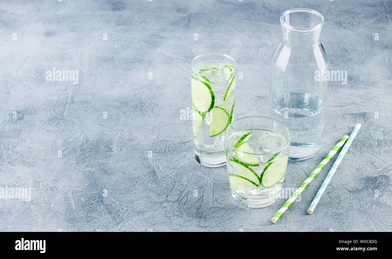 Infused water with cucumber and ice Stock Photo - Alamy