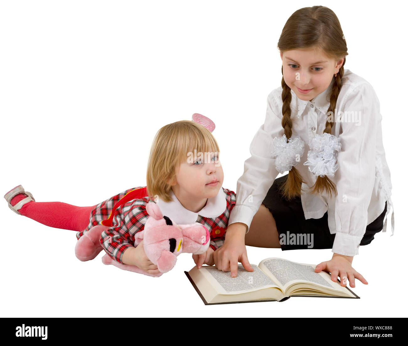 Children reading book on the white background Stock Photo - Alamy
