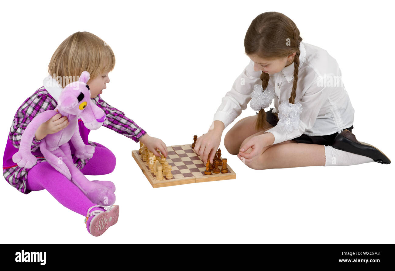 Children play chess on the white background Stock Photo - Alamy